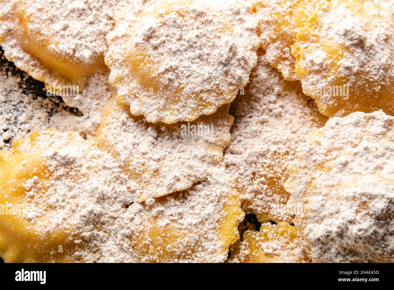 Cooking italian ravioli on wooden table. Top View with Copy Space Stock ...