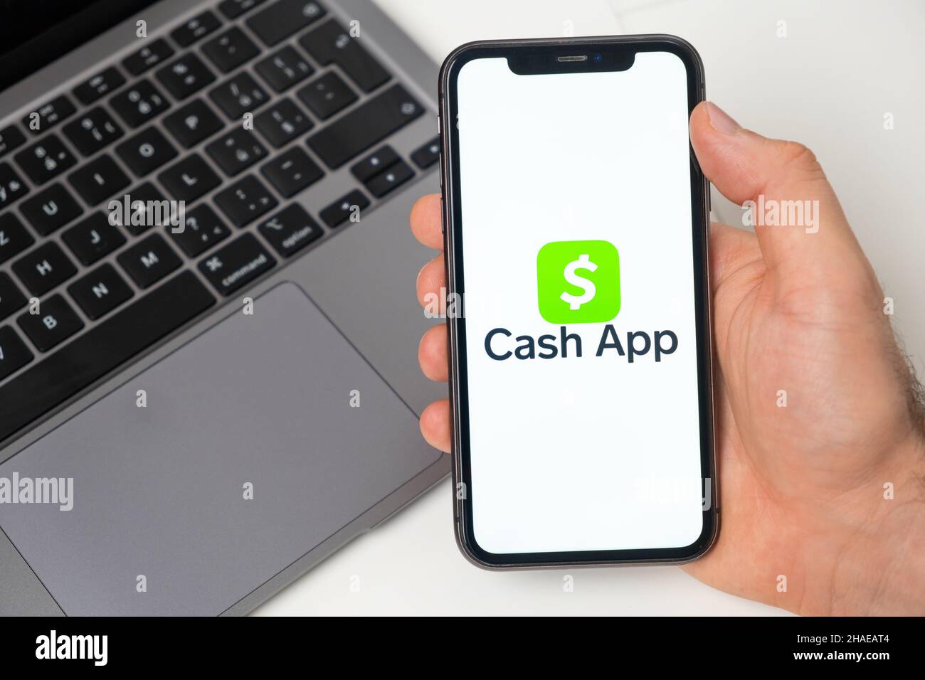 Cash App financial platform for money transfer using smartphone. Man ...