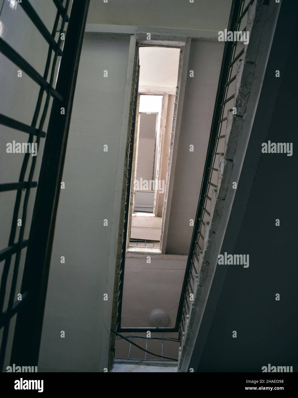 A scenic shot of a spiral abstract staircase in the building Stock ...