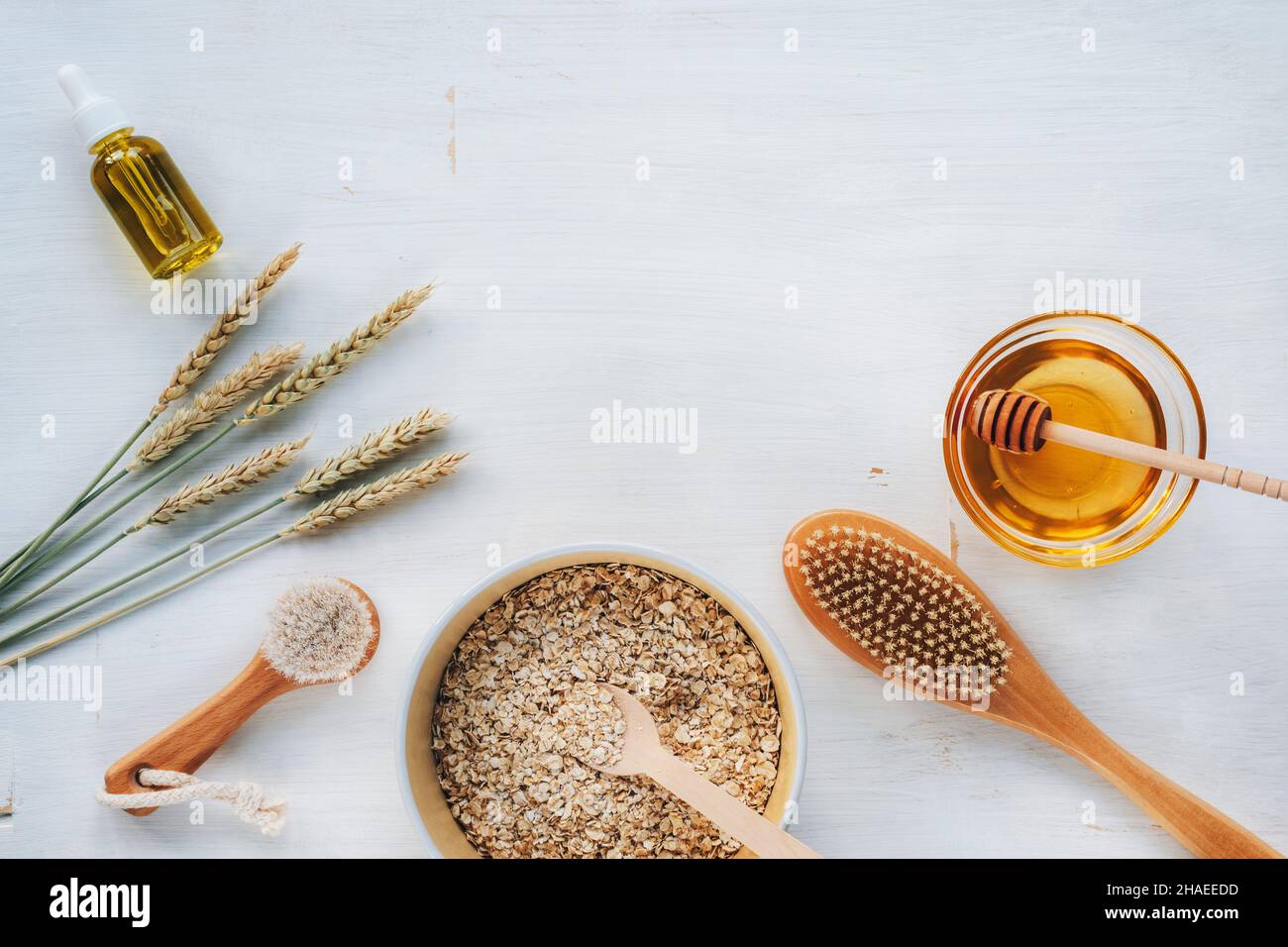 Natural ingredients for homemade scrub. Oats, oil, honey, face and body ...