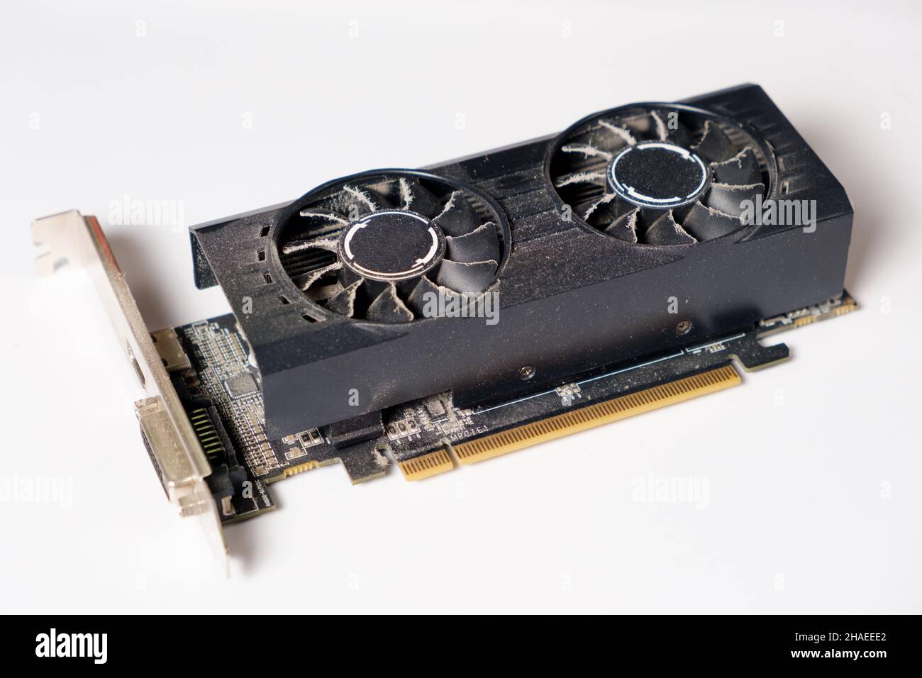 Dirty dusty graphics card in dust on a white background Stock Photo - Alamy