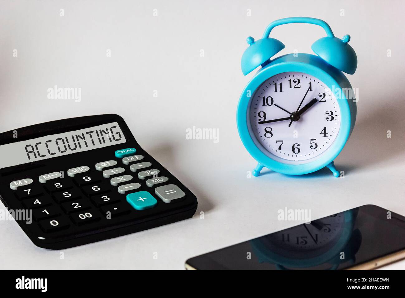 Accounting, the word is written on the display of a calculator that ...