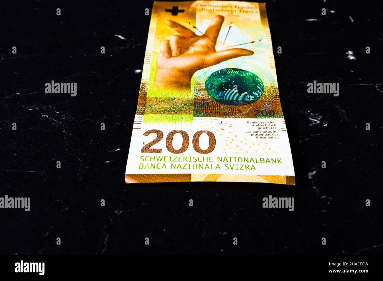 Swiss franc banknote. CHF currency, world money concept Stock Photo - Alamy