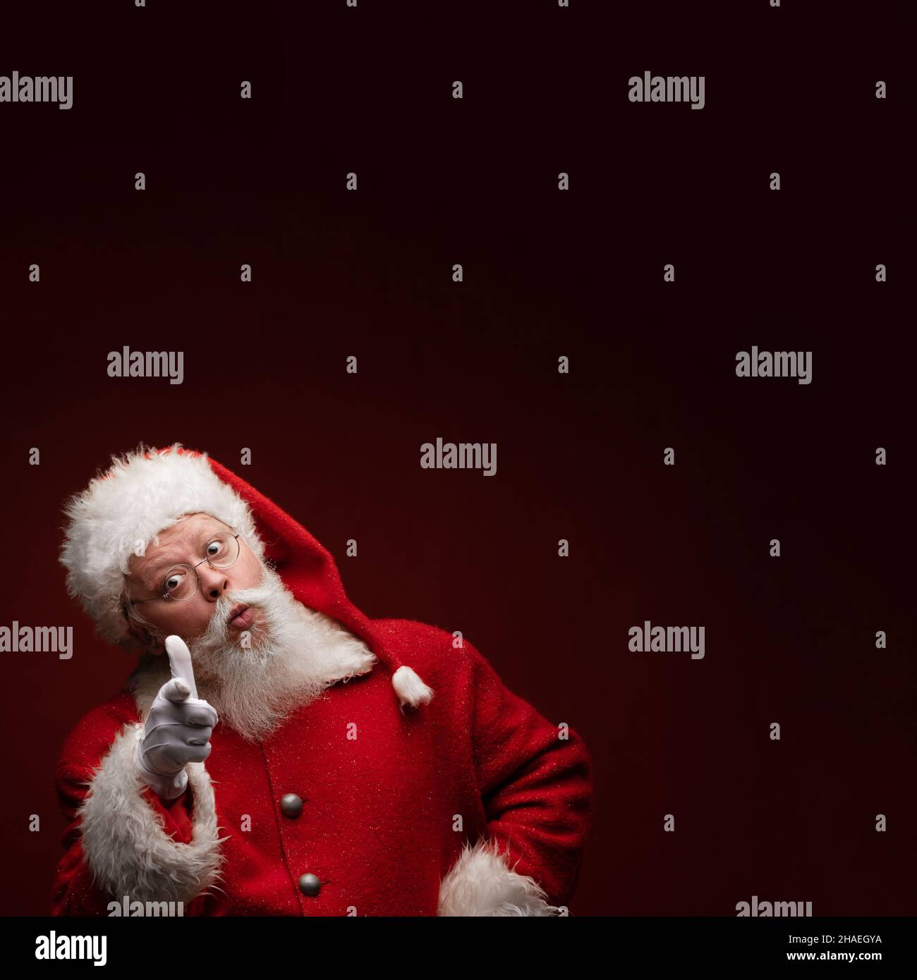 Funny santa claus pointing copy hi-res stock photography and images - Alamy
