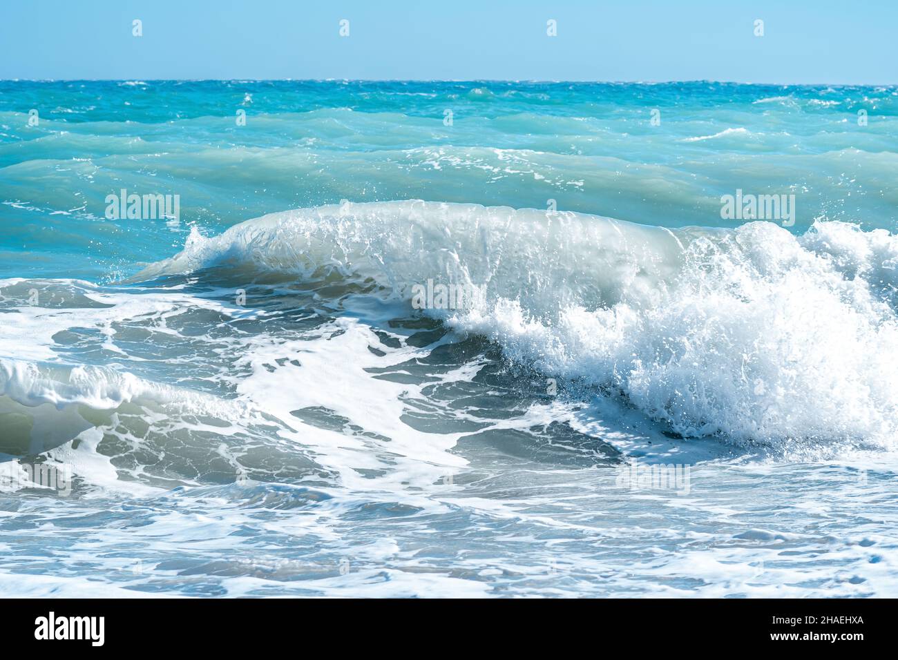 sea surf on the beach close-up, waves and foam Stock Photo - Alamy