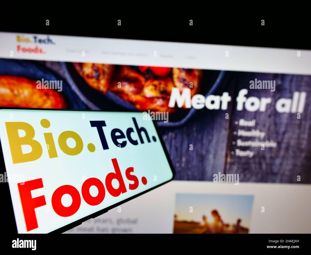 Cellphone with logo of Spanish cultured meat company BioTech Foods on ...