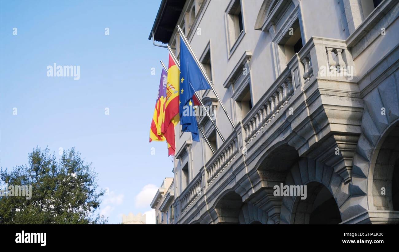 Colorful flags from different countries on building background. Stock ...