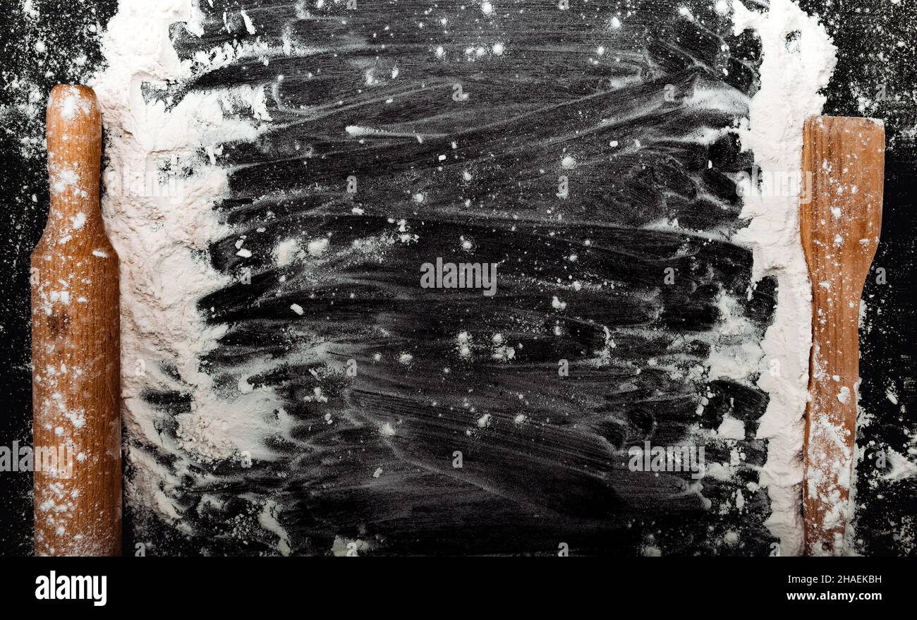 Flour or powder background on black background with whimsical abstract ...