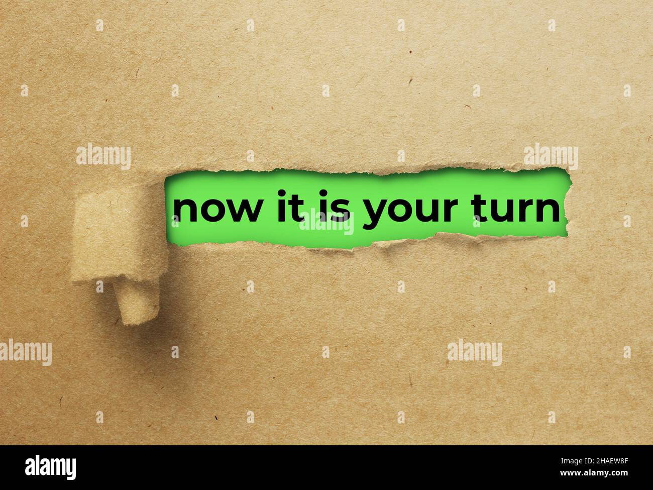 Torn and twisted paper strip revealing now it is your turn Stock Photo ...