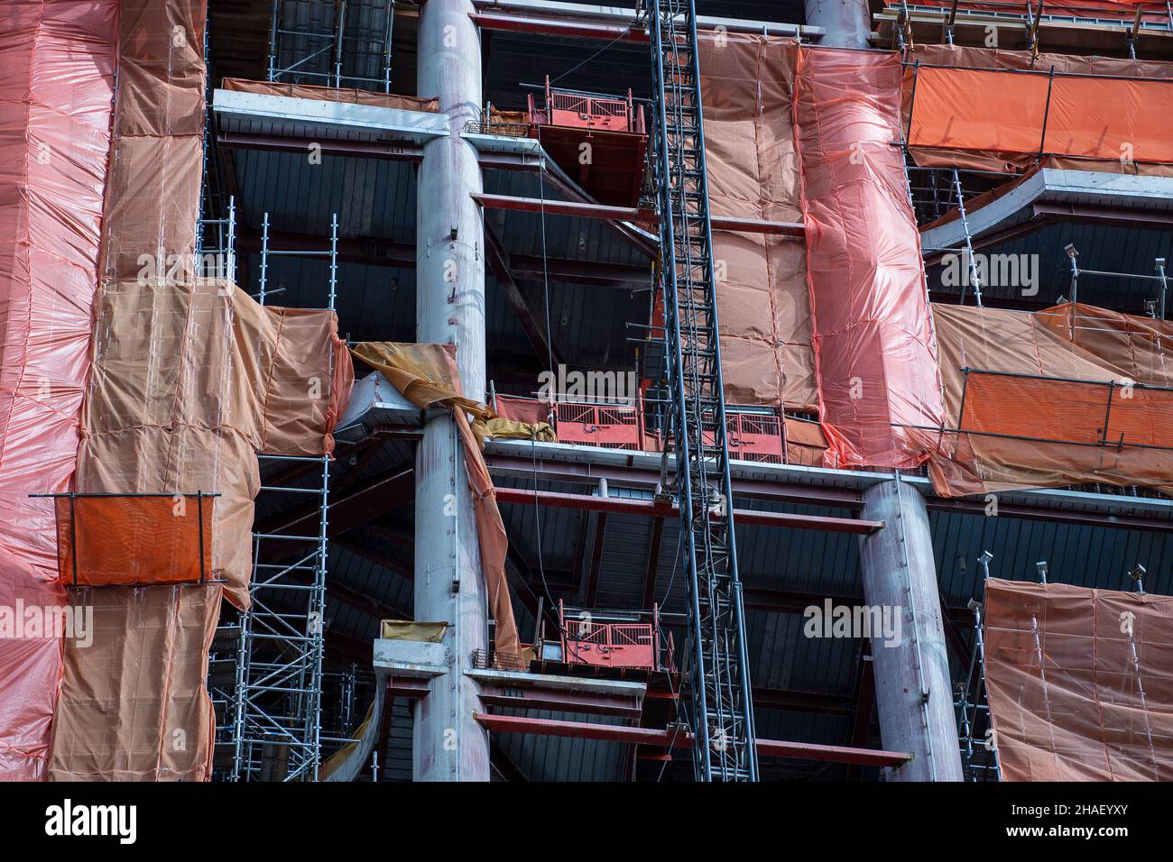 Protective net covers the city's scaffolding for safety and legal ...