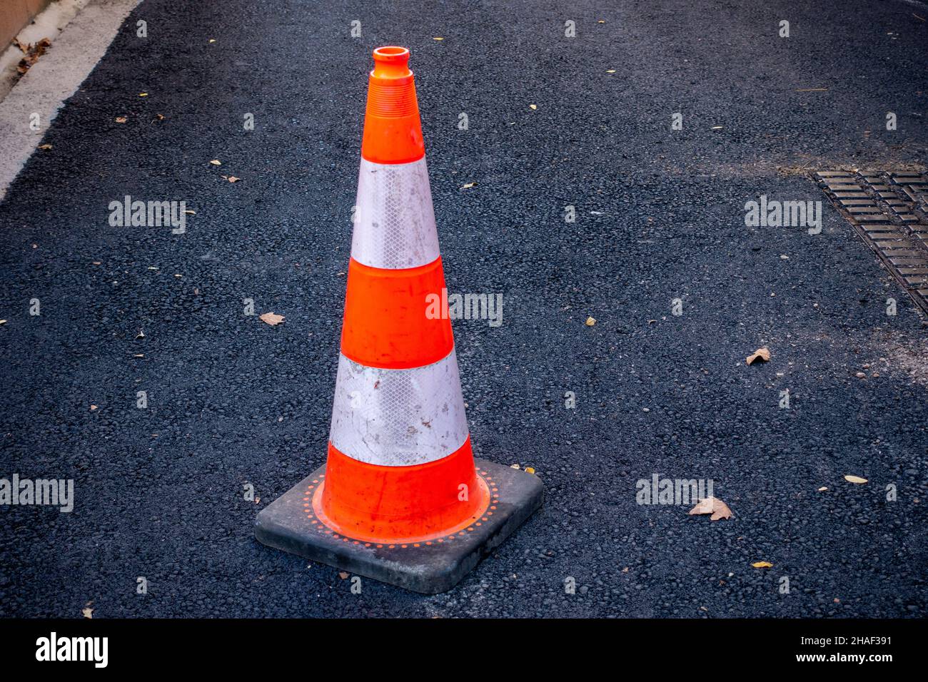 warning road cone marking blocked off road Stock Photo - Alamy