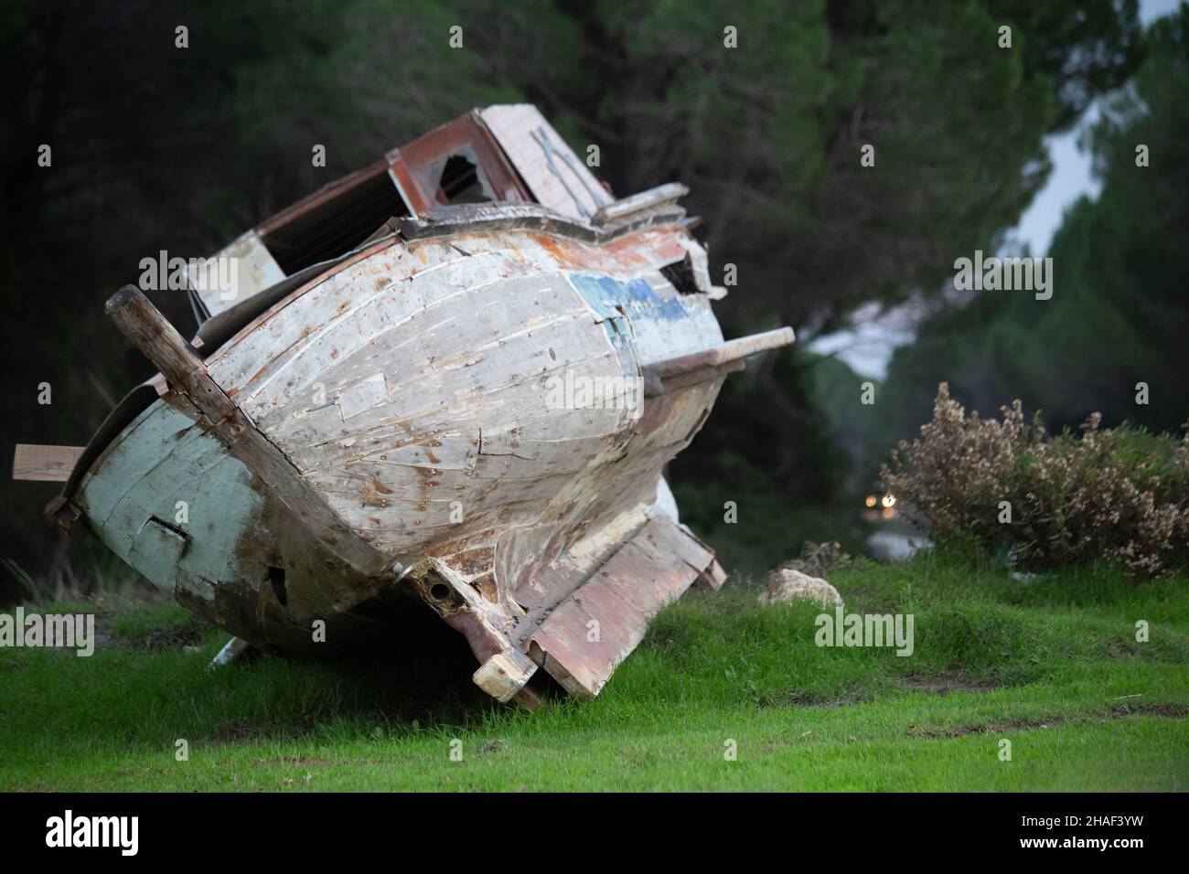 A boat landed for repair Stock Photo - Alamy