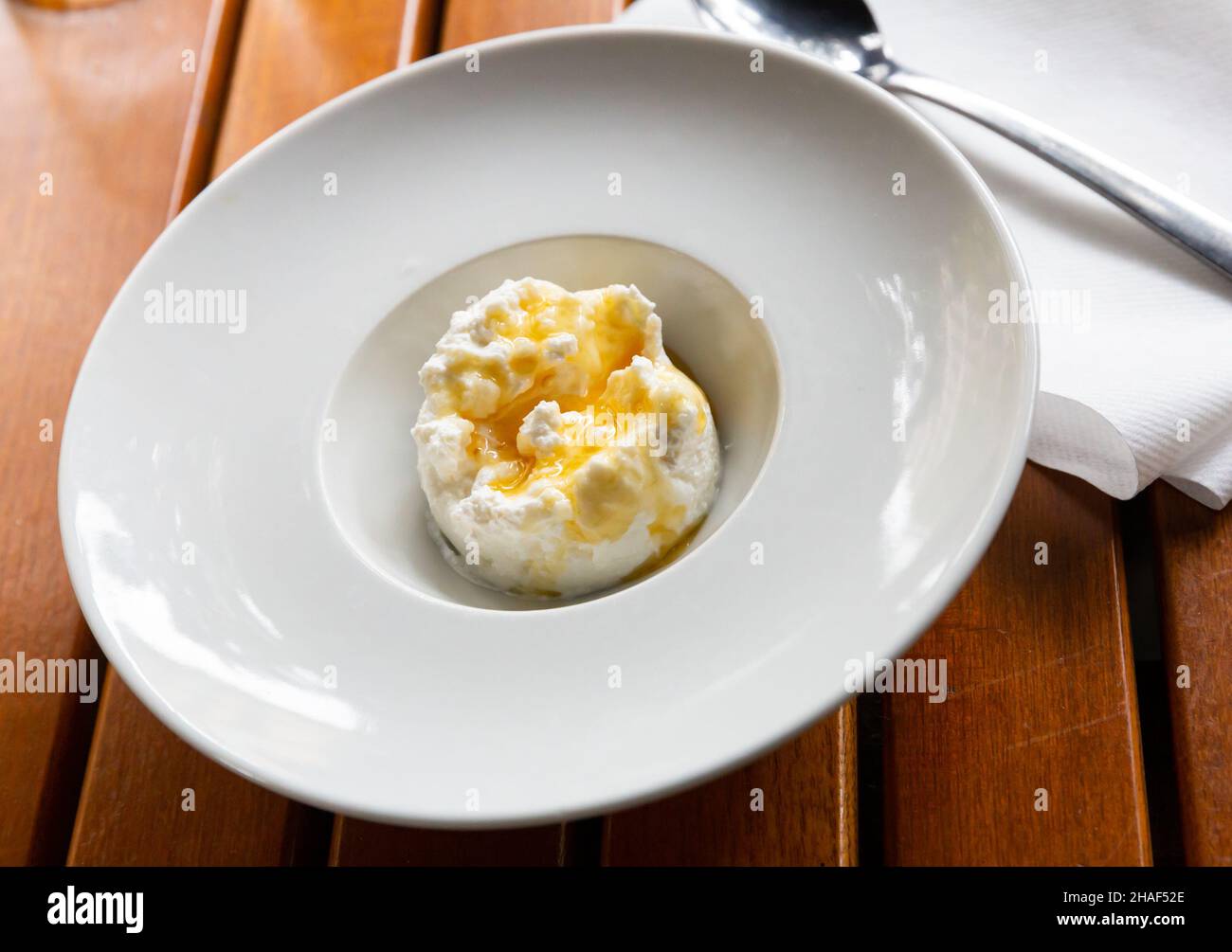Traditional Catalan dessert - fresh cheese Mato with honey Stock Photo ...