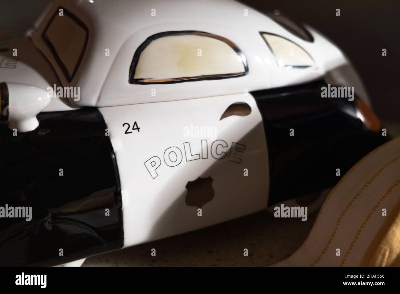 A closeup of a black and white police toy car Stock Photo - Alamy