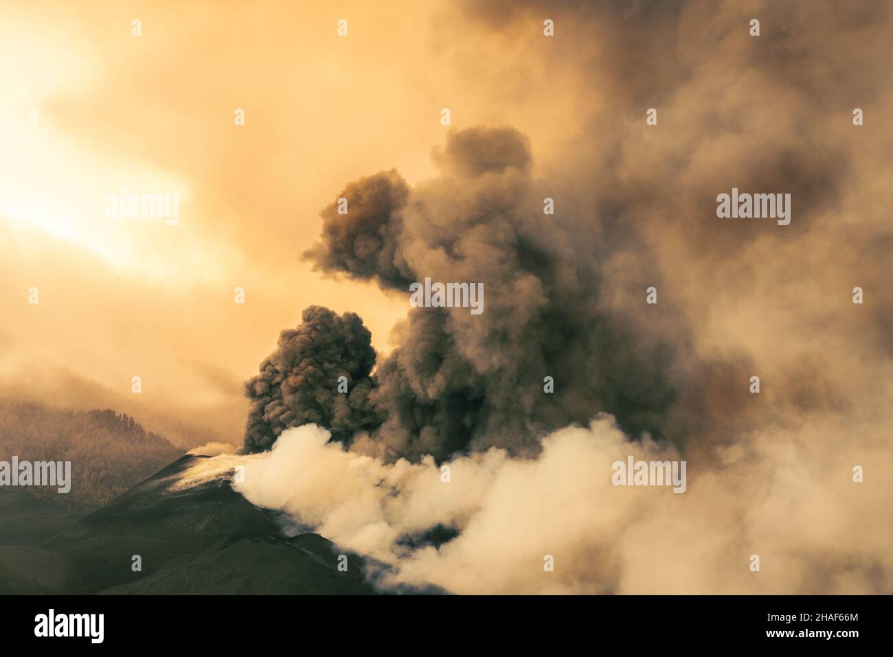A cloud of heavy smoke caused by the eruption Stock Photo - Alamy