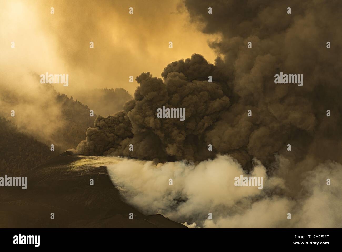 A cloud of heavy smoke caused by the eruption Stock Photo - Alamy