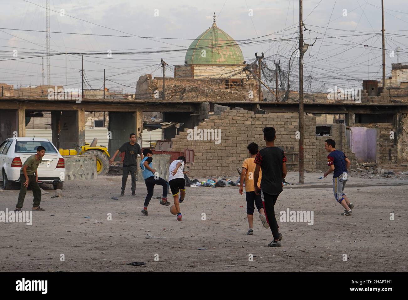 Children playing football in iraq hi-res stock photography and images ...
