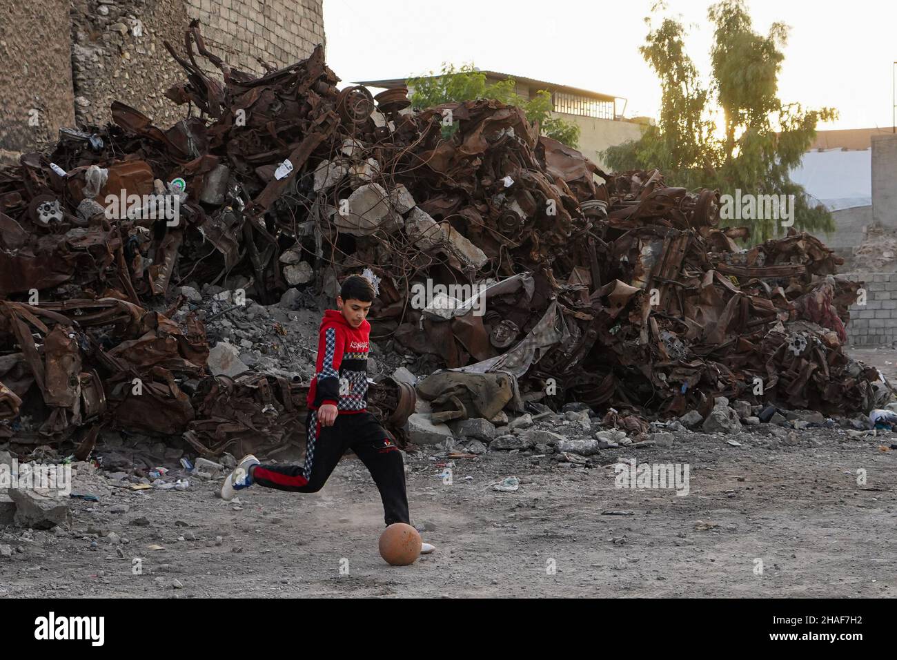 Children playing football in iraq hi-res stock photography and images ...