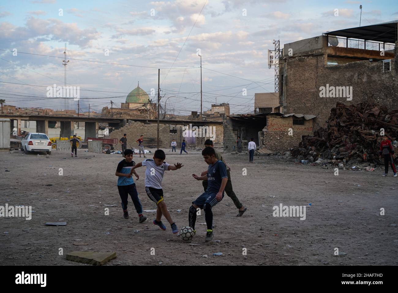 Children playing football in iraq hi-res stock photography and images ...