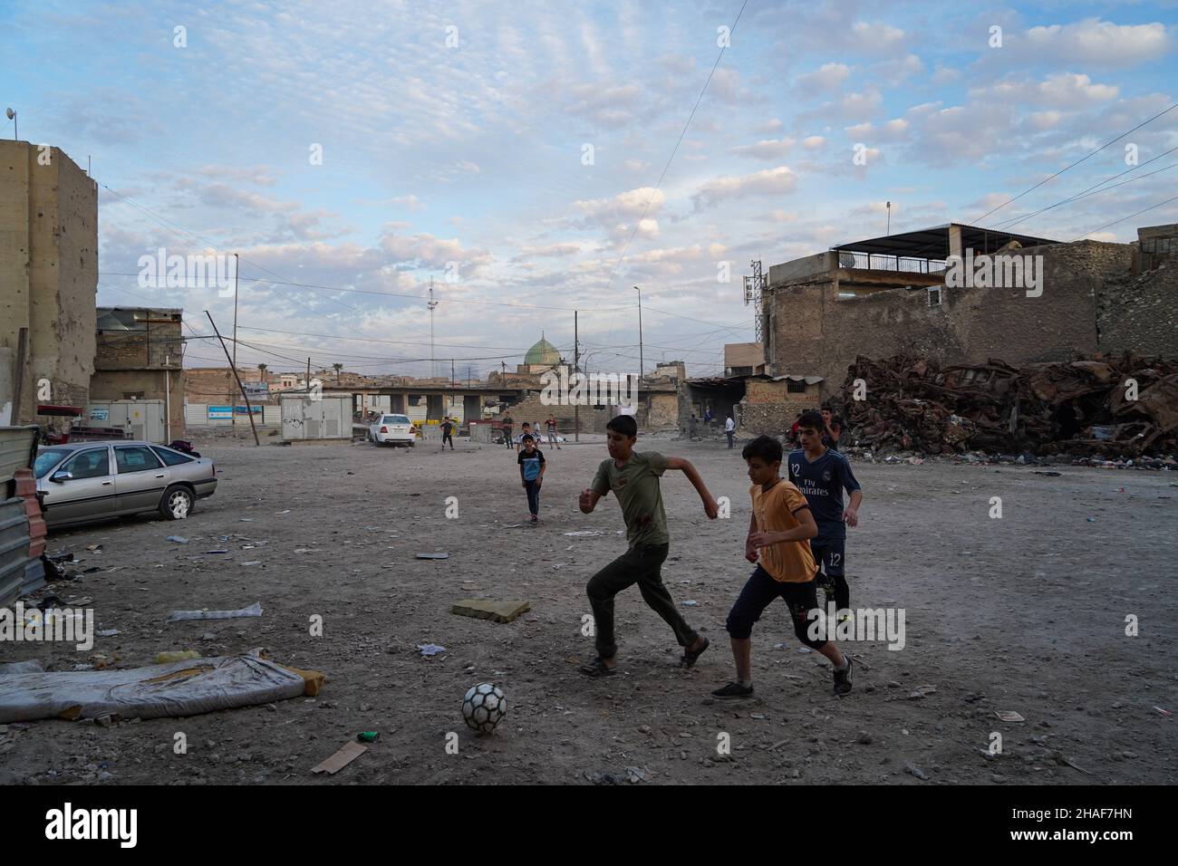 Children playing football in iraq hi-res stock photography and images ...
