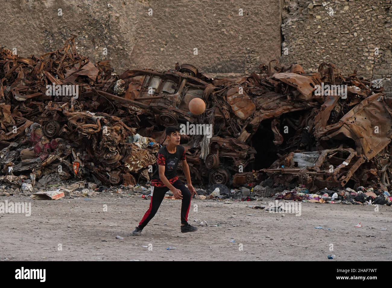 Children playing football in iraq hi-res stock photography and images ...