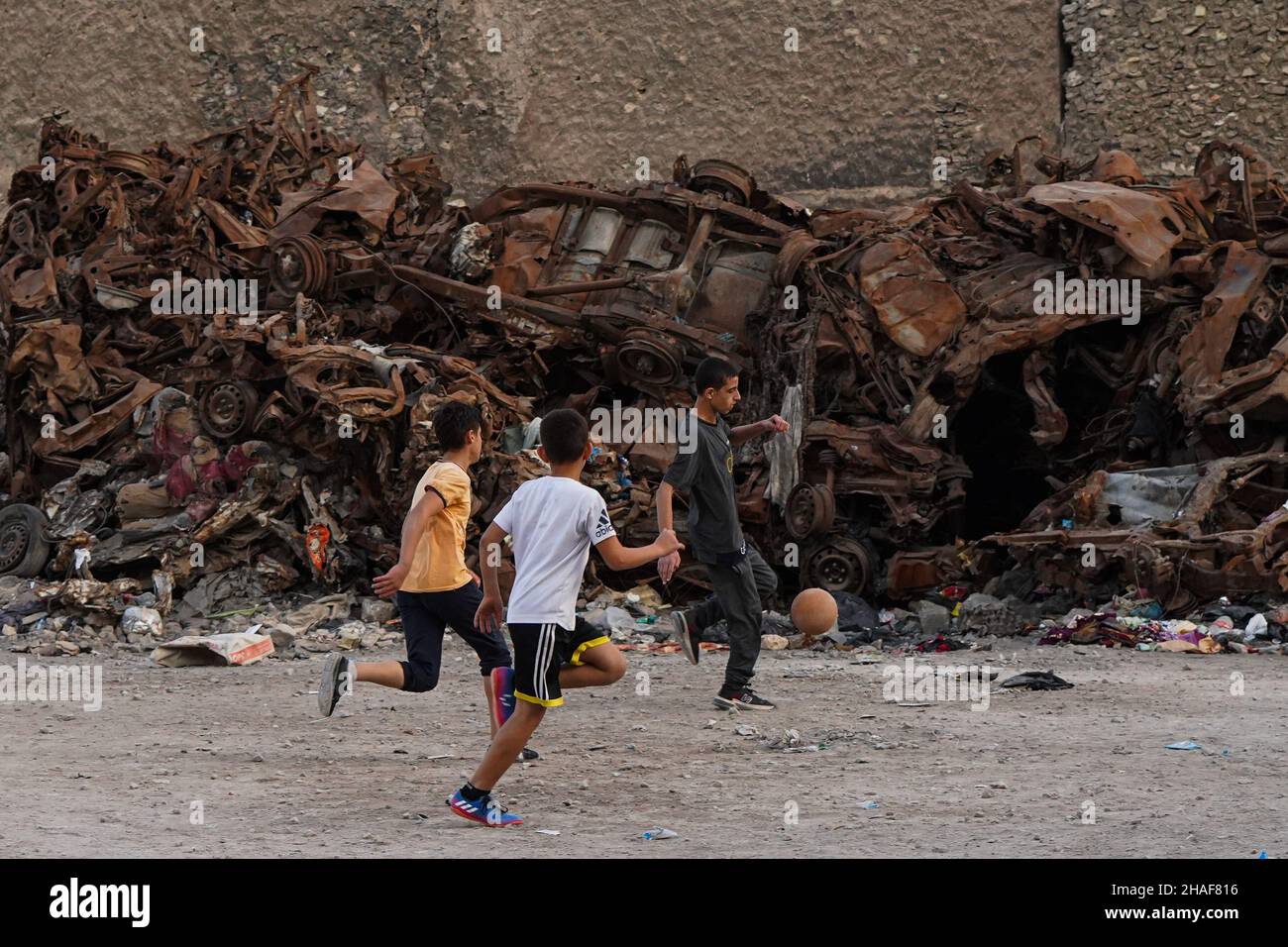 Children playing football in iraq hi-res stock photography and images ...