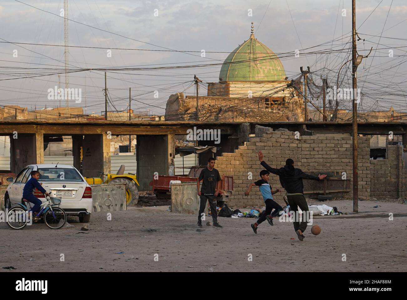 Children playing football in iraq hi-res stock photography and images ...