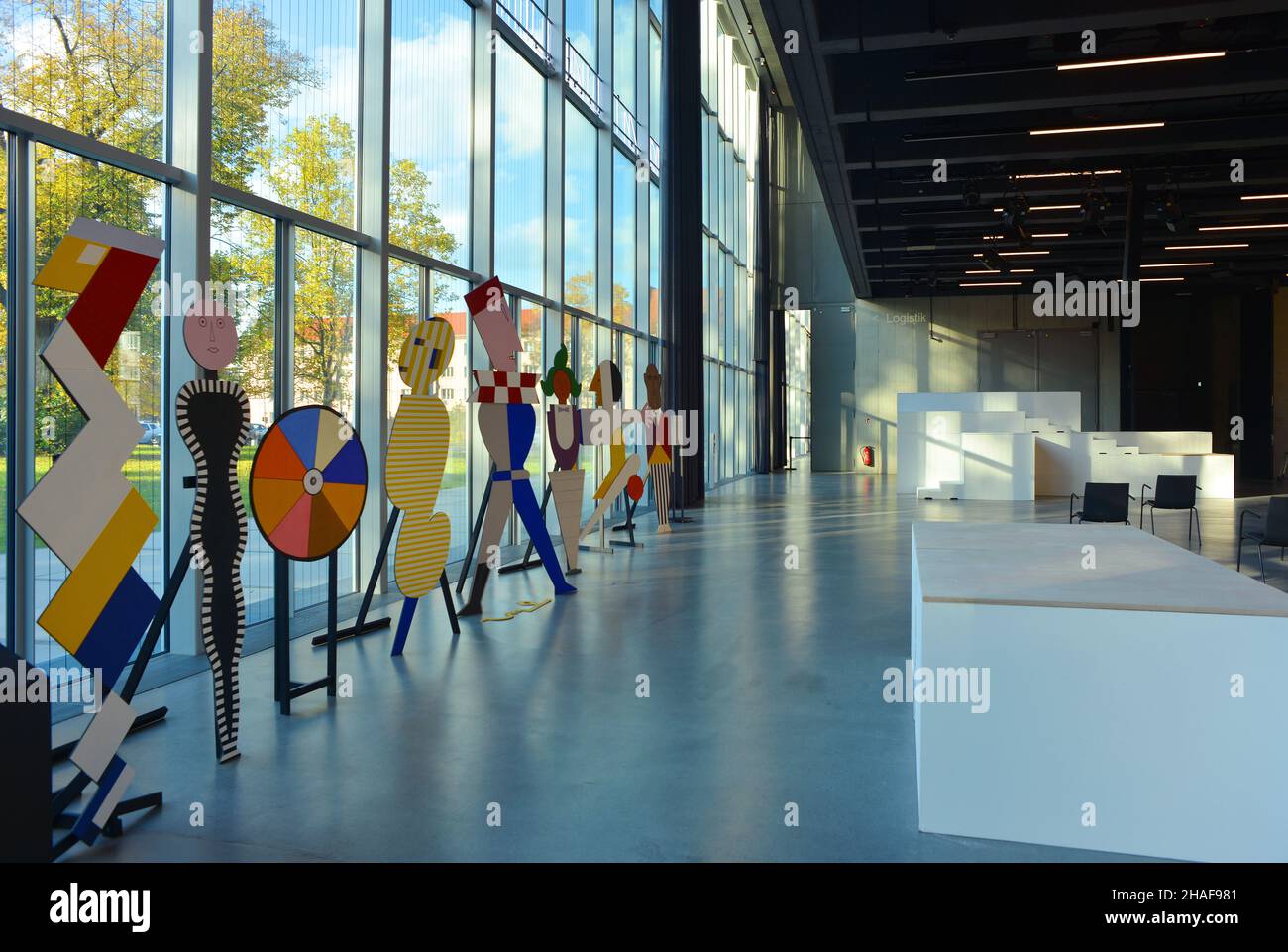 Dessau, Germany, Bauhaus museum building entry hall with funny figures ...