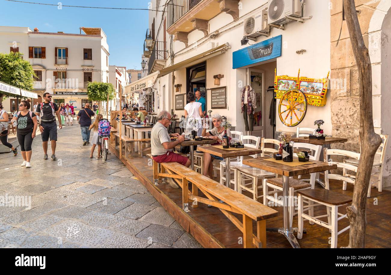 Favignana, Trapani, Italy - September 22, 2016: Tourists enjoying the ...