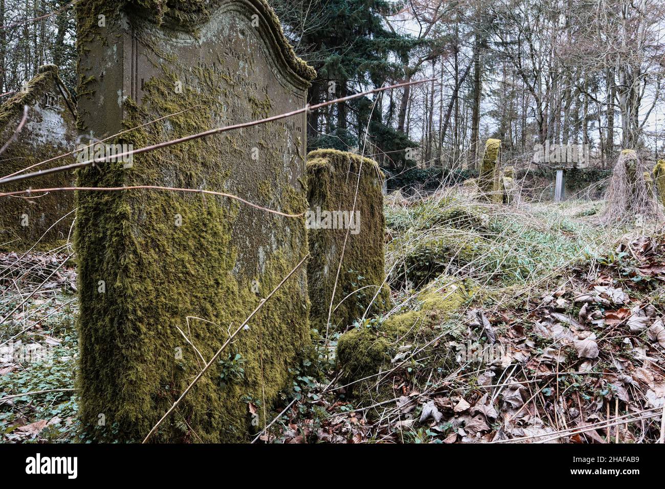 Old stone graves moss cemetery hi-res stock photography and images - Alamy