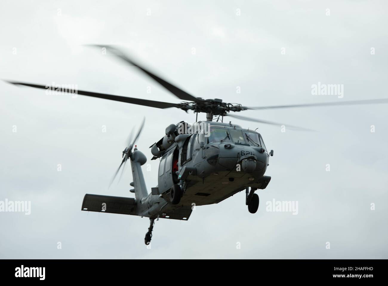 A U.S. Navy MH-60S Sea Hawk with Helicopter Sea Combat Squadron 12 ...