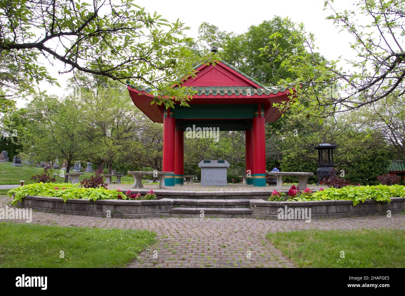 Small Asian Oriental Red Temple with Flowers in Cemetery Horizontal ...