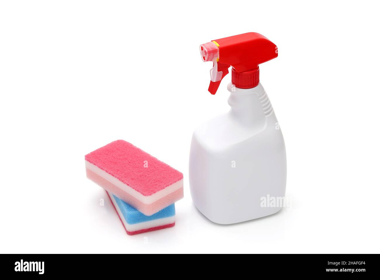 Spray plastic bottle and cleaning sponge on a white background Stock ...