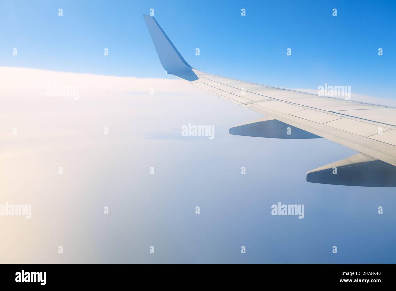 Aircraft wing in flight . View from plane window Stock Photo - Alamy