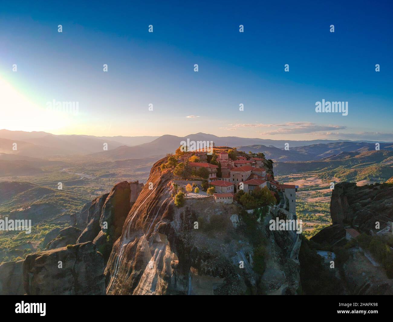 Aerial view over Meteora, a rock formation in central Greece hosting ...