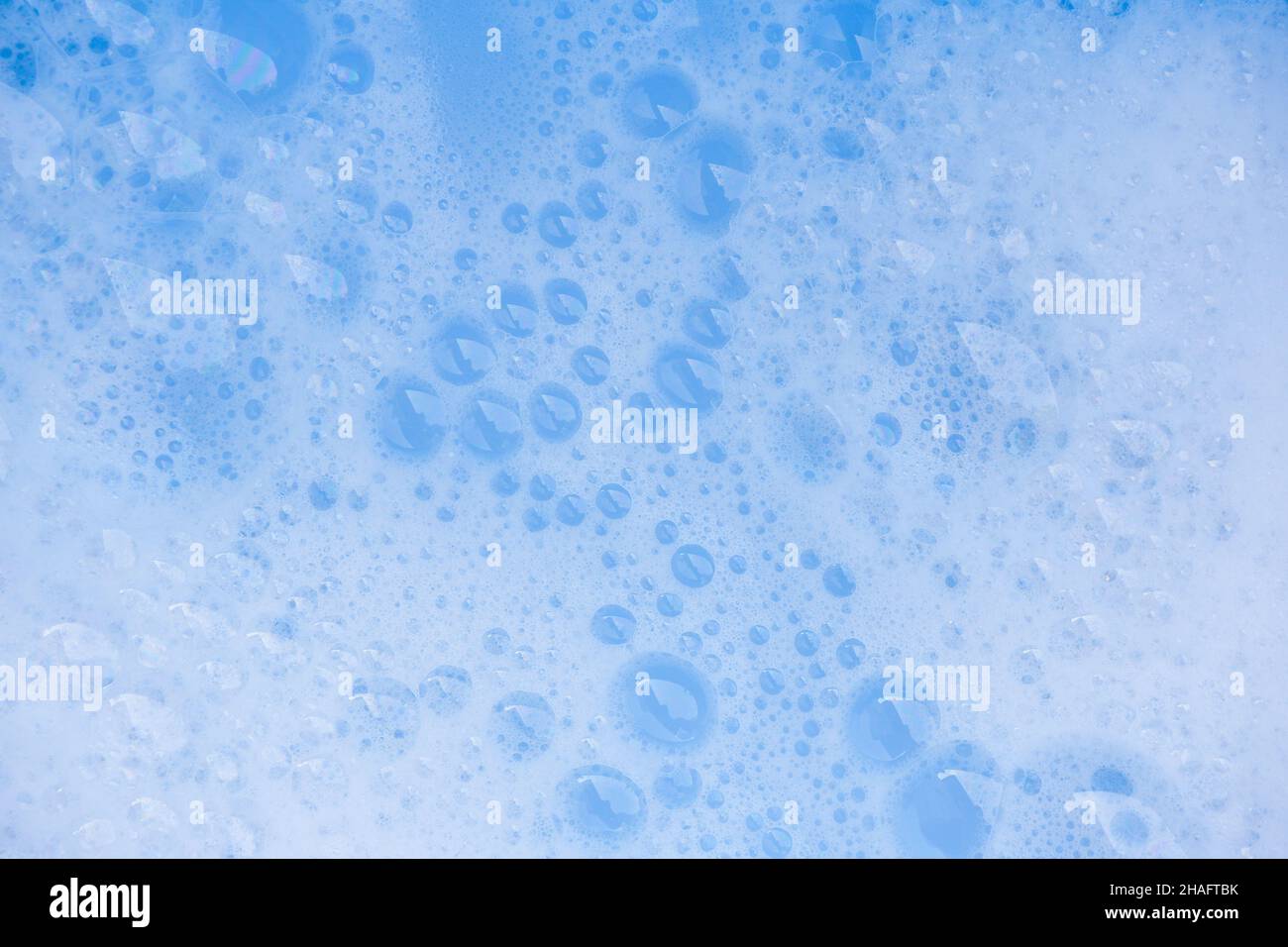 Abstract background white soapy foam texture. Shampoo foam with bubbles ...