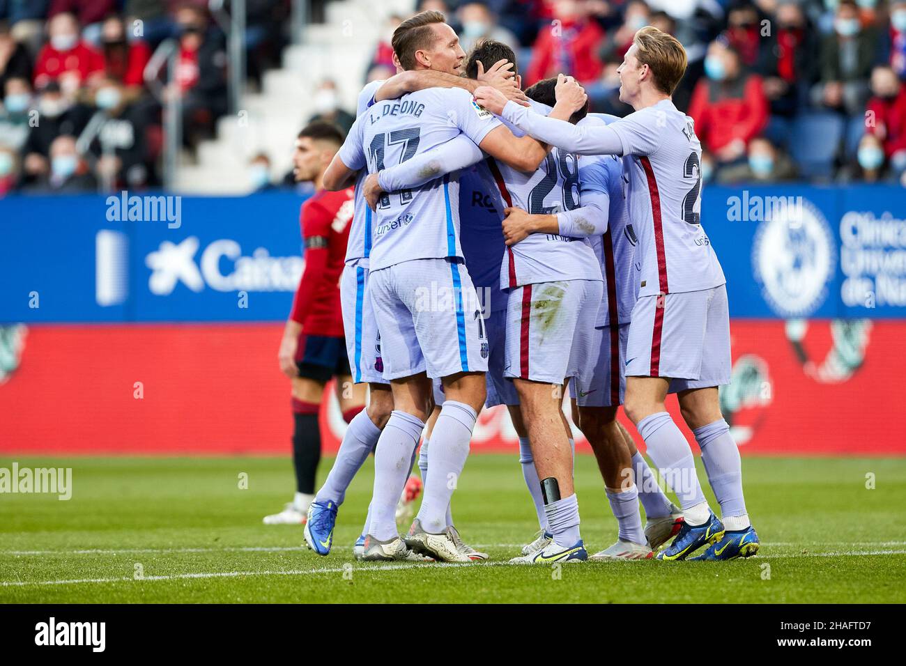 Pamplona, Spain. 12th Dec, 2021. FC Barcelona players celebrate a goal ...