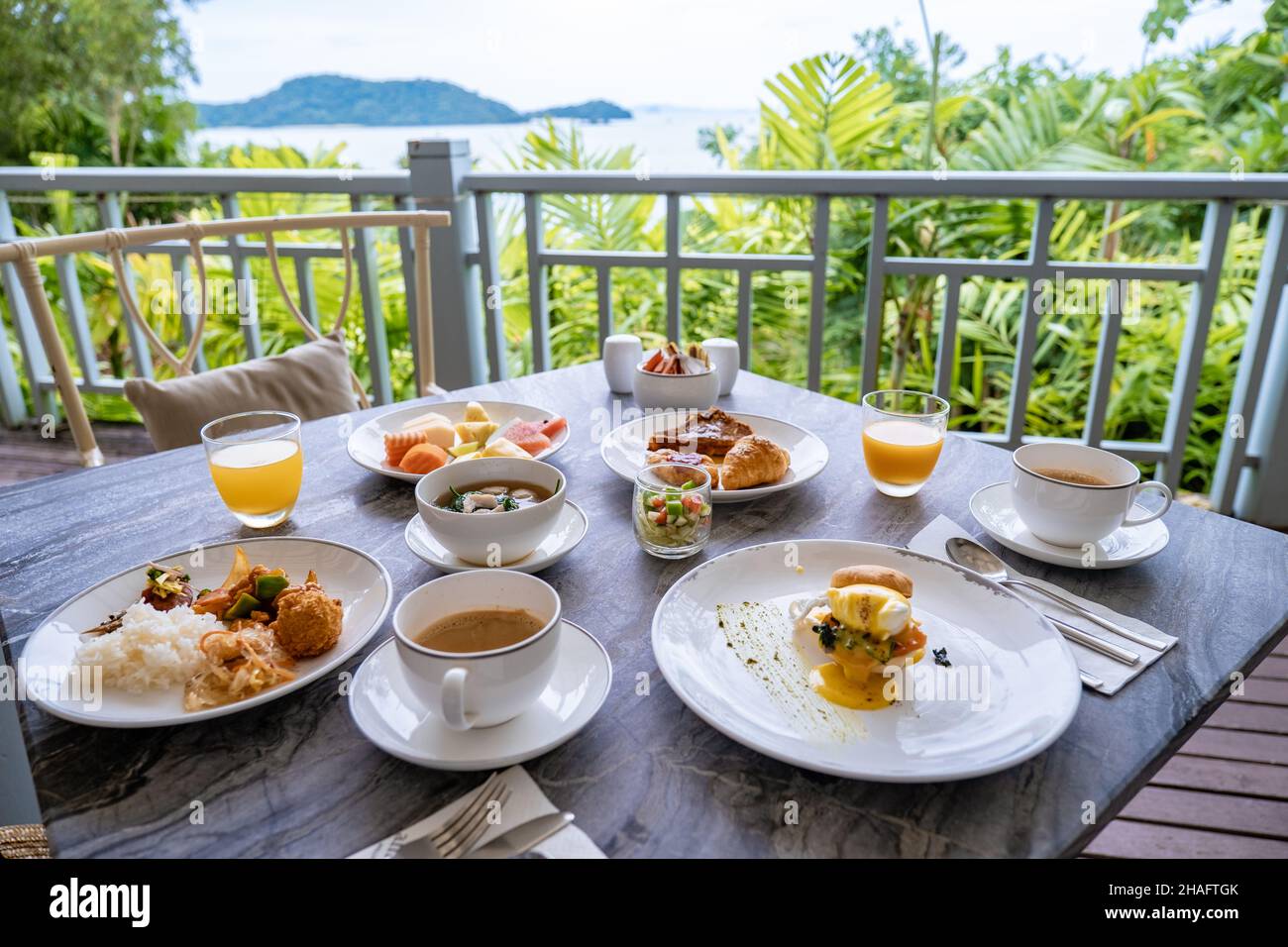 Breakfast table looking out over the ocean, breakfast with coffee bread ...