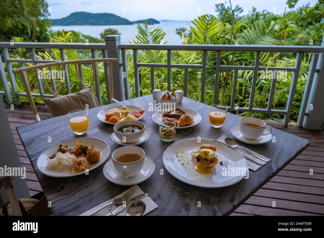 Breakfast table looking out over the ocean, breakfast with coffee bread ...