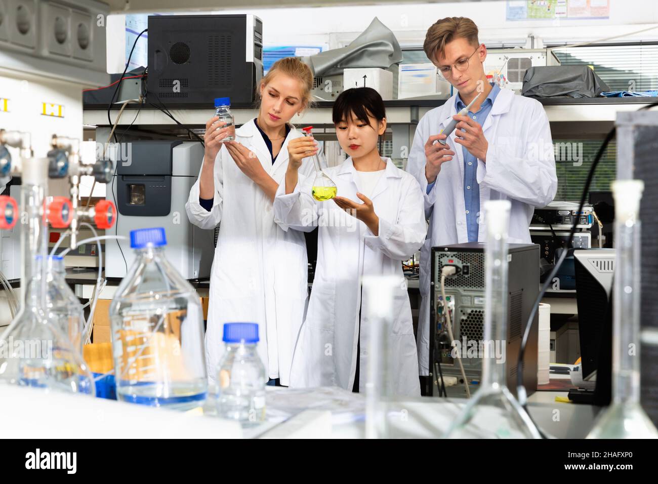 Group of European and Chinese diligent efficient positive scientists ...