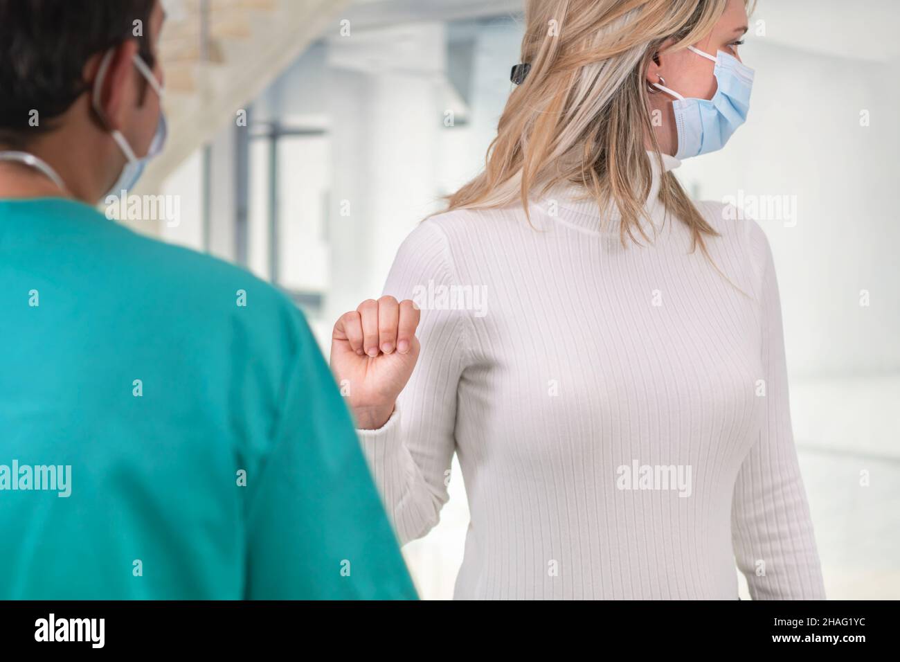 Selective focus of a hand of a woman doing new hand sign advertising ...