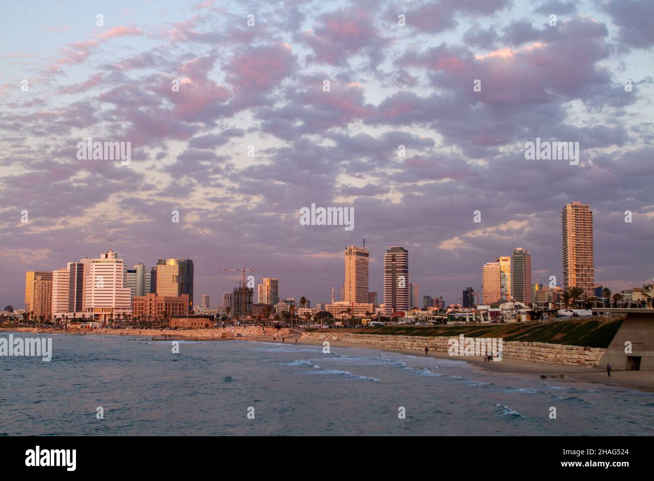 Israel, Tel Aviv coastline as seen from south from Old Jaffa at sunset ...