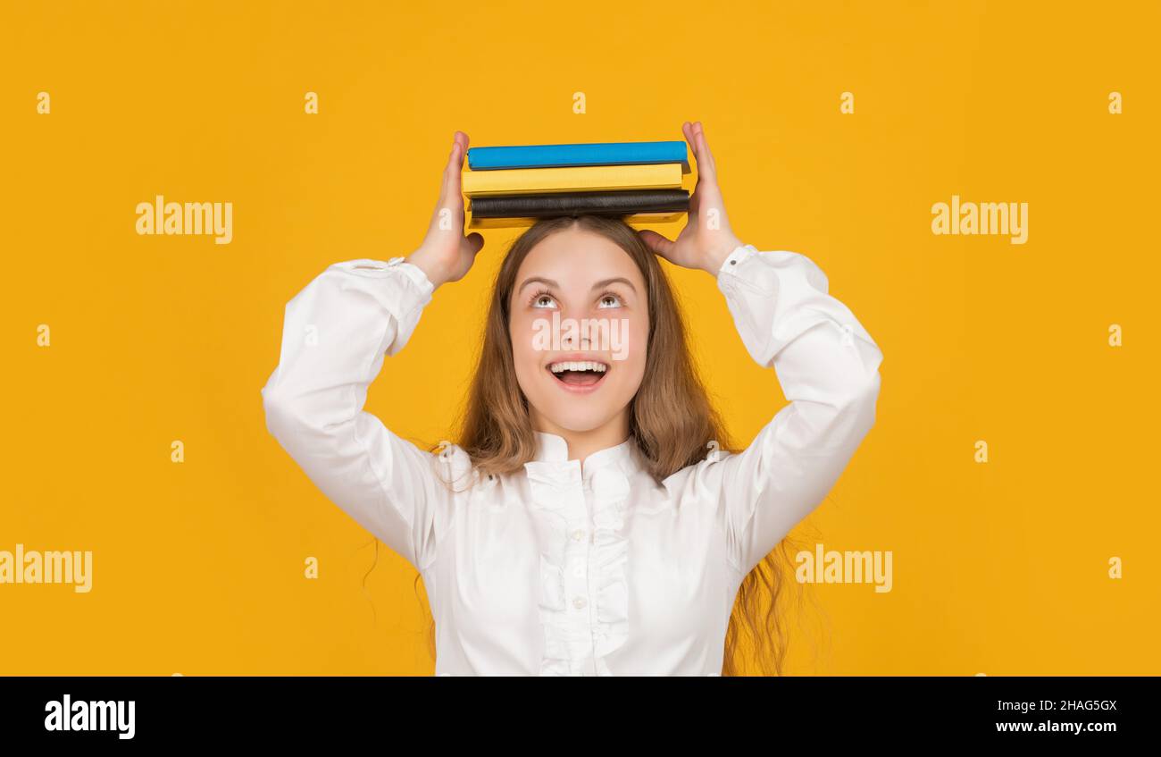 knowledge day. kid hold notebook. student in high school. teen girl do ...