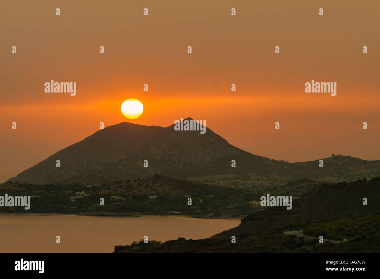 Famous sunset at Sounio in Greece Stock Photo - Alamy
