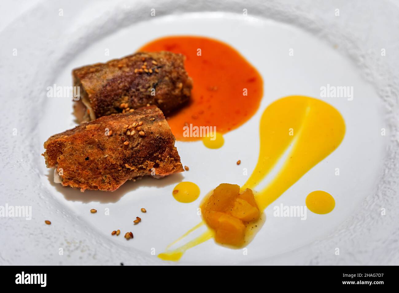 Traditional Spanish poor man's food, crispy pig trotters served with ...