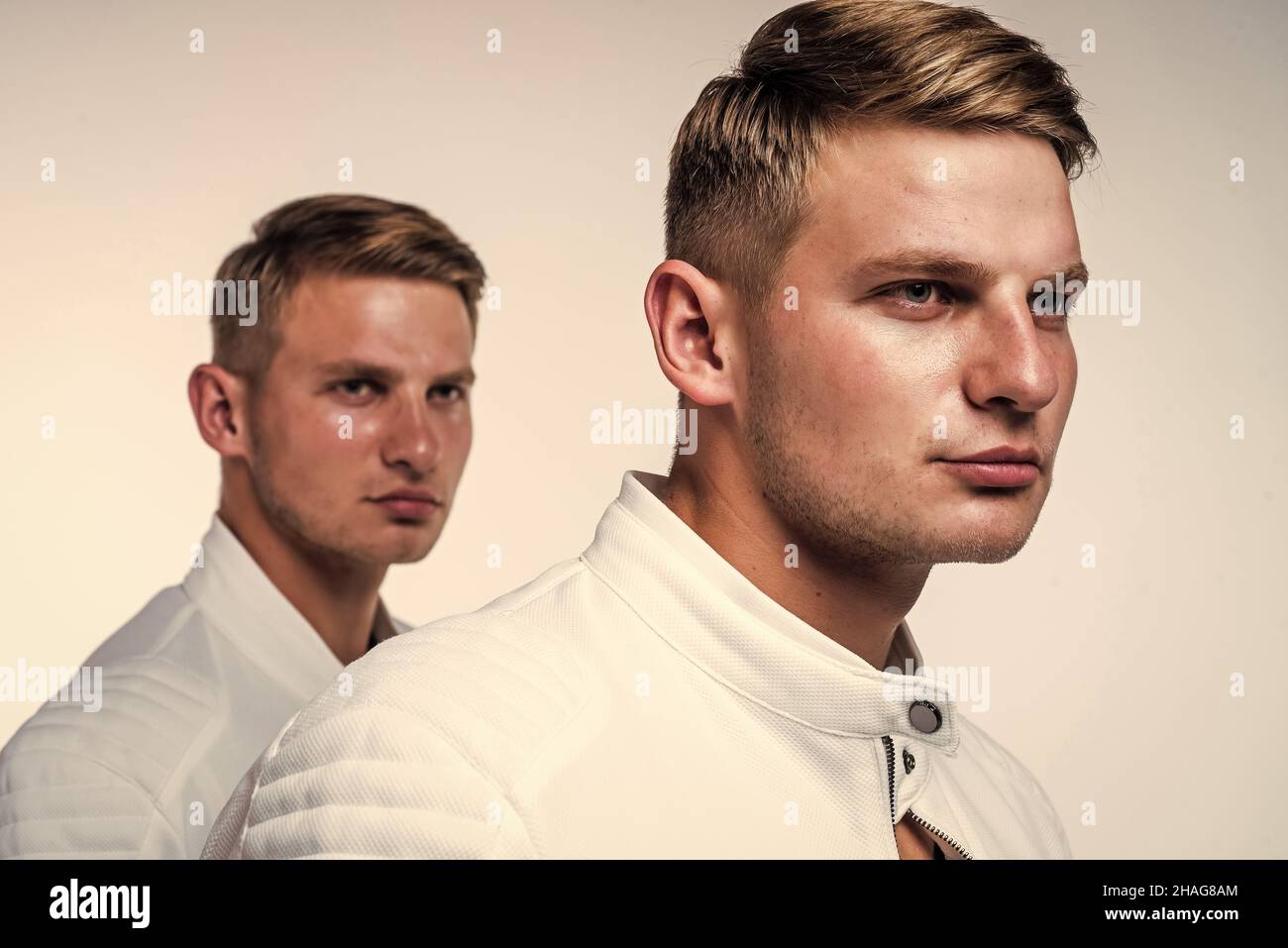young twin brothers with similar appearance, twins Stock Photo - Alamy