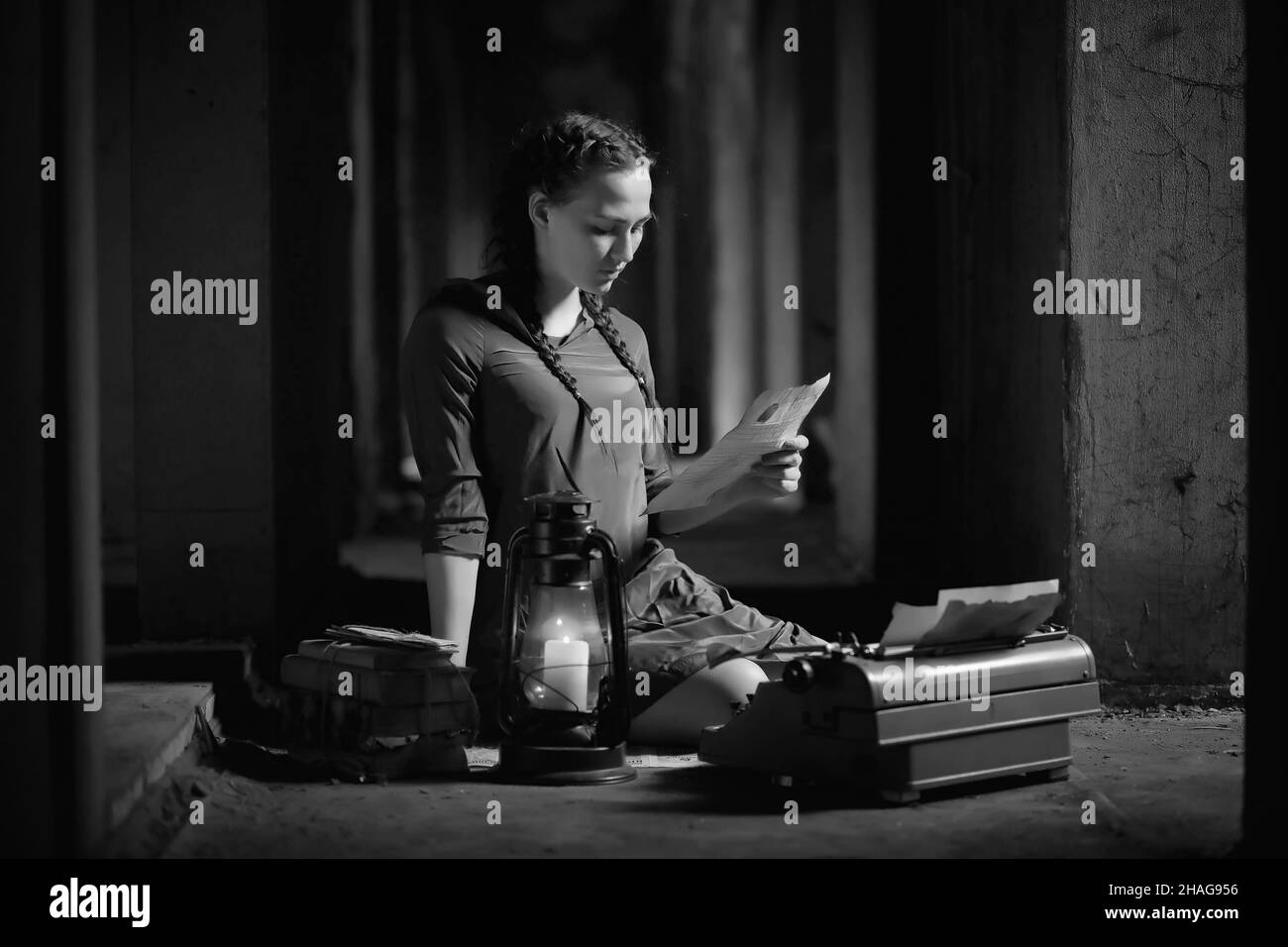 Retro girl in the old house reading books and writing a story Stock ...