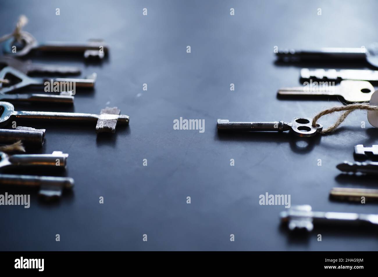 Set of vintage keys for lock. Retro keys on a dark stone background ...