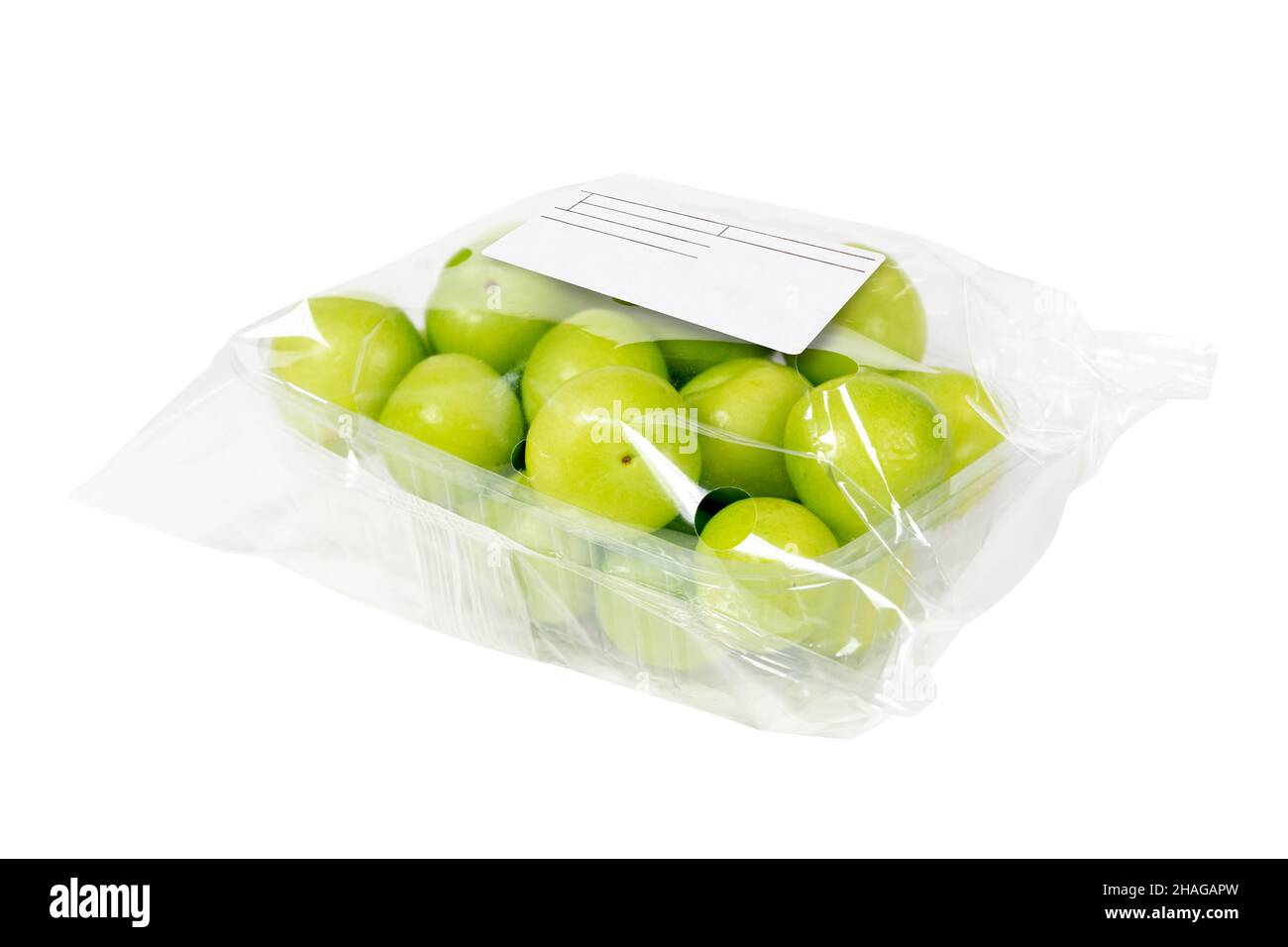 Packaged delicious green plums on a white isolated background Stock ...