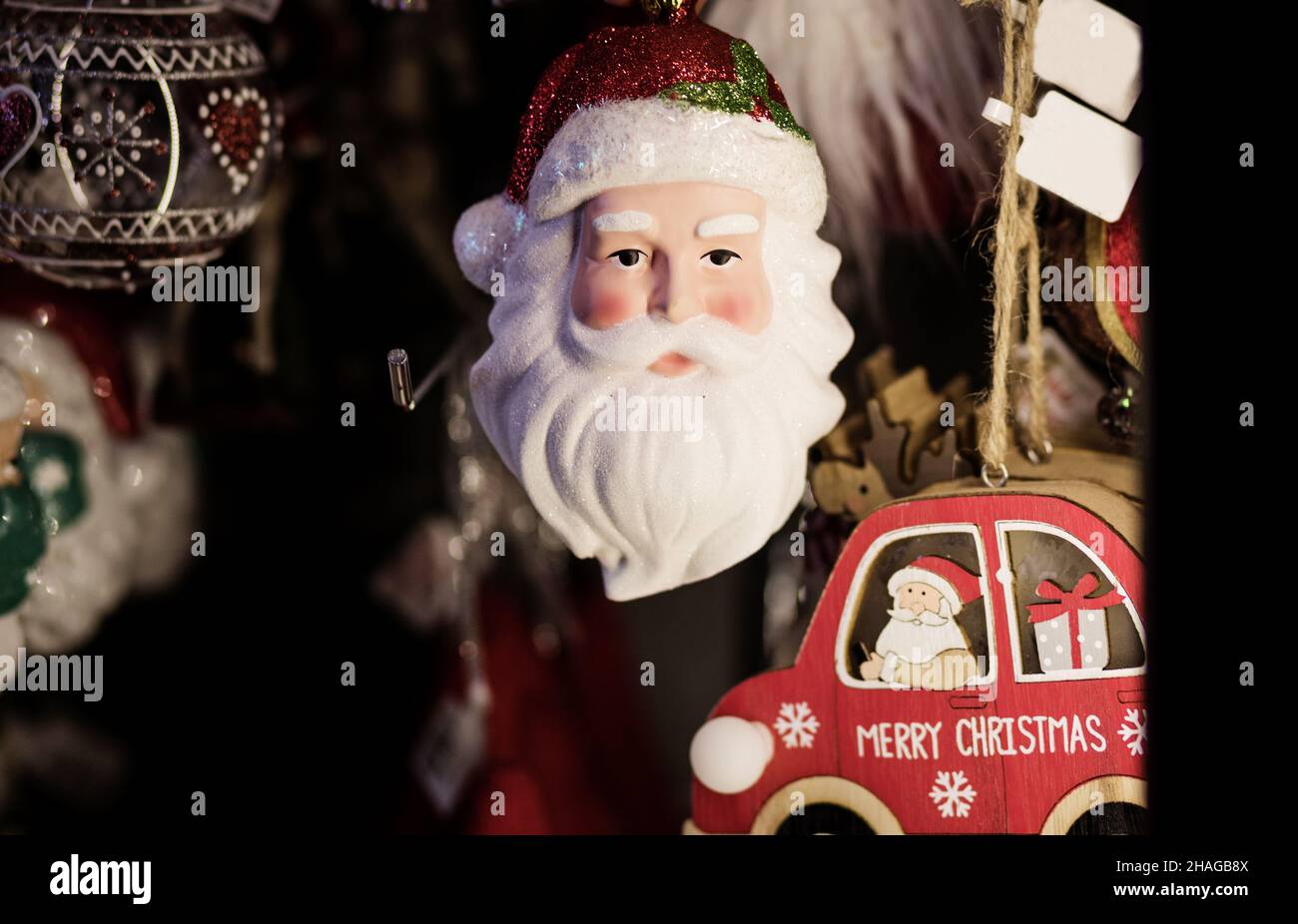 Santa Claus figurine. Santa claus statue with christmas decorations and ...